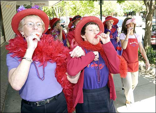 Red Hatters strut their stuff in downtown sidewalk parade | News ...